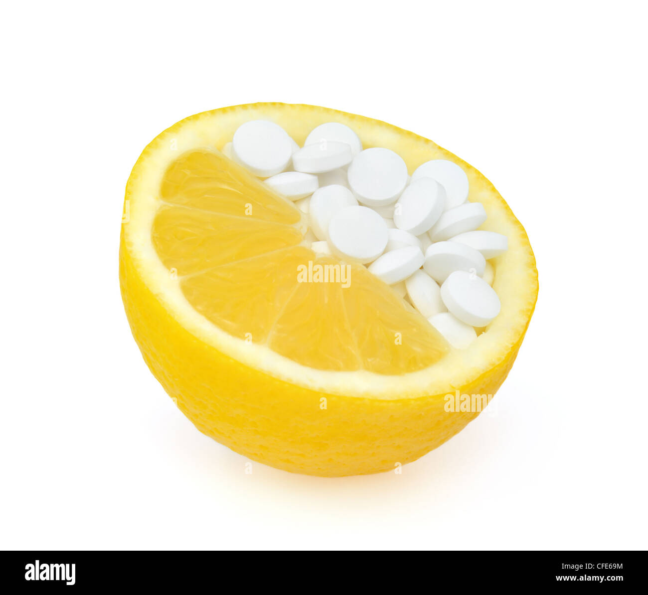 Close up of fresh lemon and pills isolated – vitamin concept - white ...