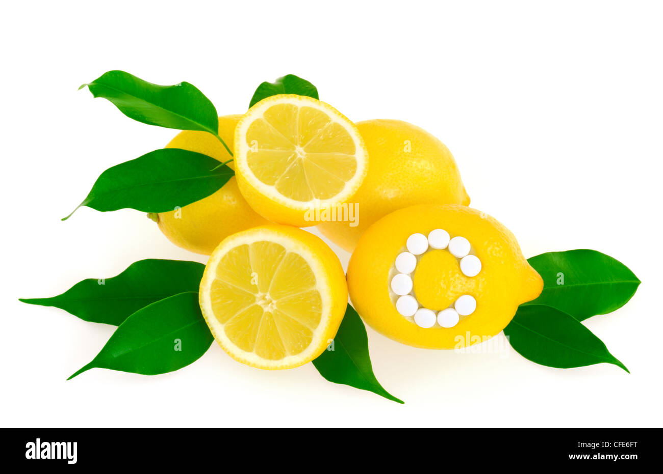 Group of lemons with vitamin c pills over white background – concept ...