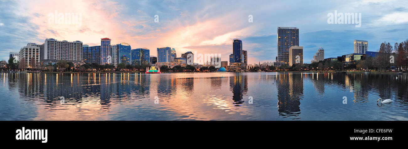 Orlando downtown Lake Eola panorama with urban buildings and reflection ...