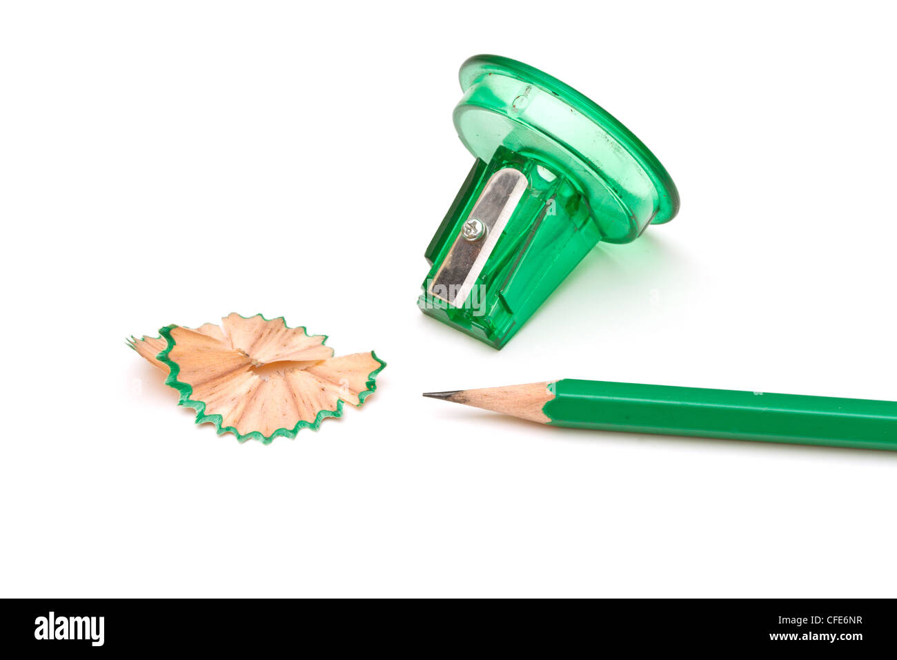 Green sharpener and pencil on white background Stock Photo - Alamy
