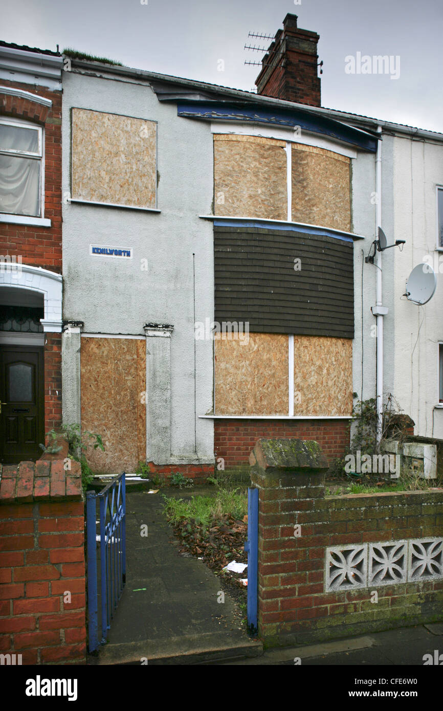 Run-down and boarded up terraced house, Grimsby, North East ...