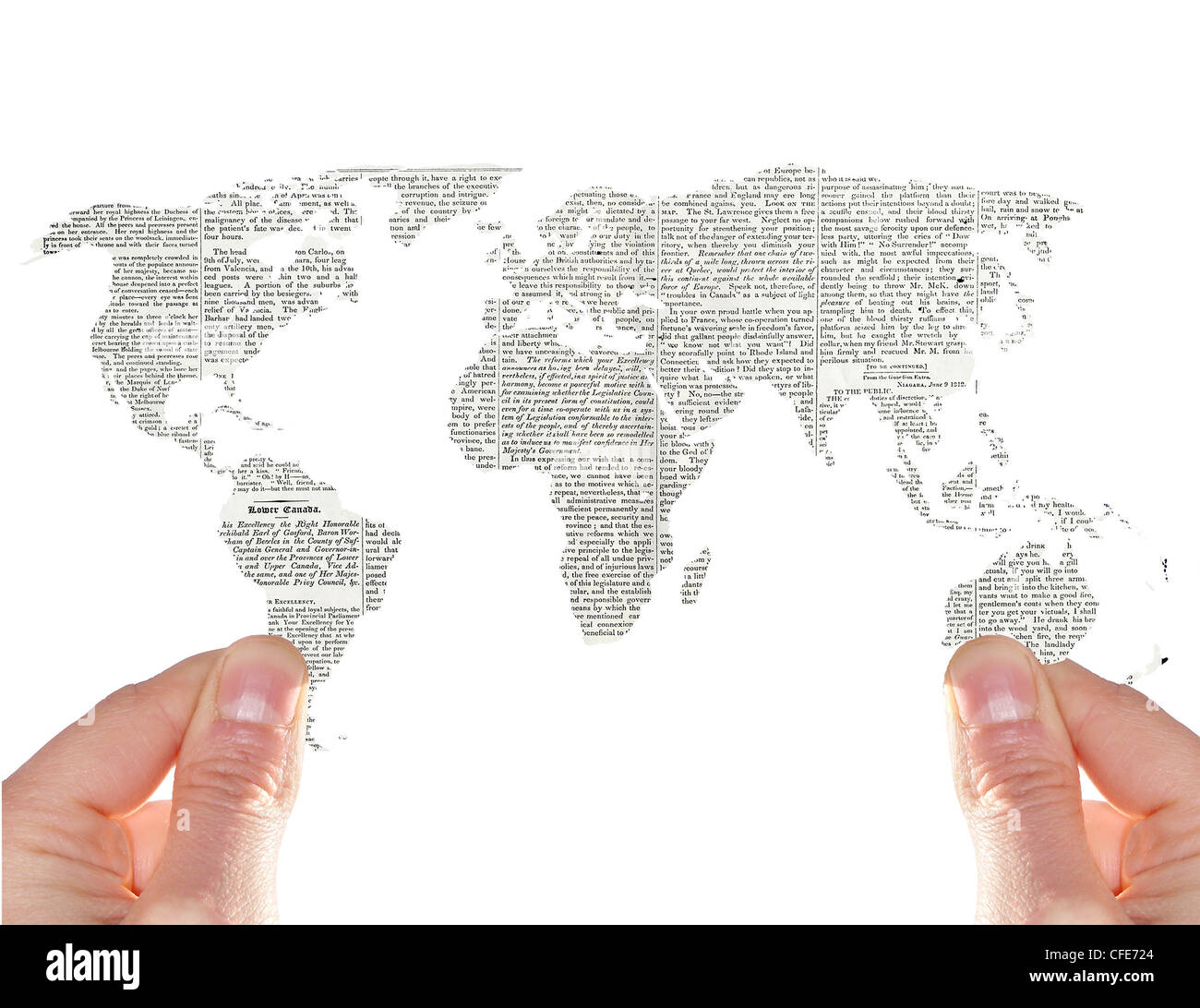 hands show a newspaper world map Stock Photo - Alamy