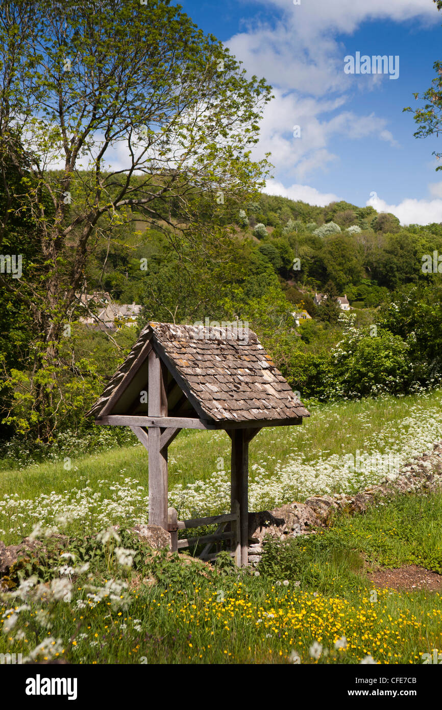 UK, Gloucestershire, Stroud, Sheepscombe, wild flowers around lych gate ...