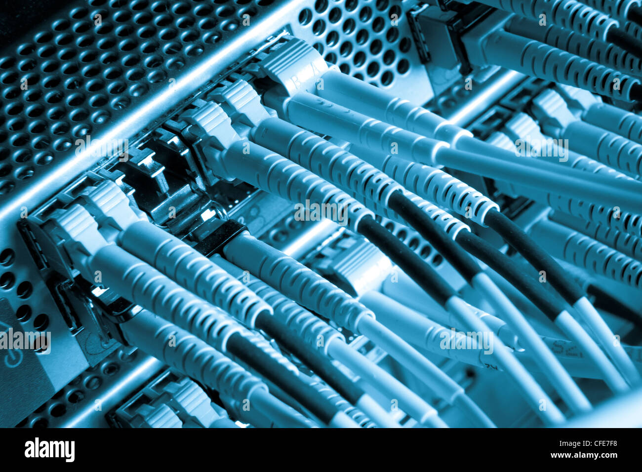 optic fiber cables connected to hub Stock Photo - Alamy