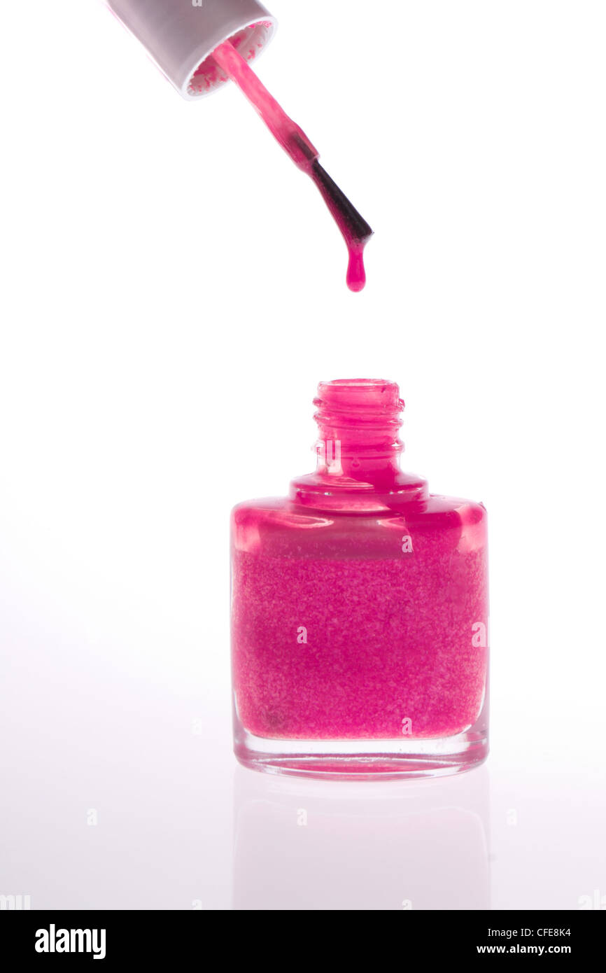 dripping nail polish isolated on white background Stock Photo - Alamy