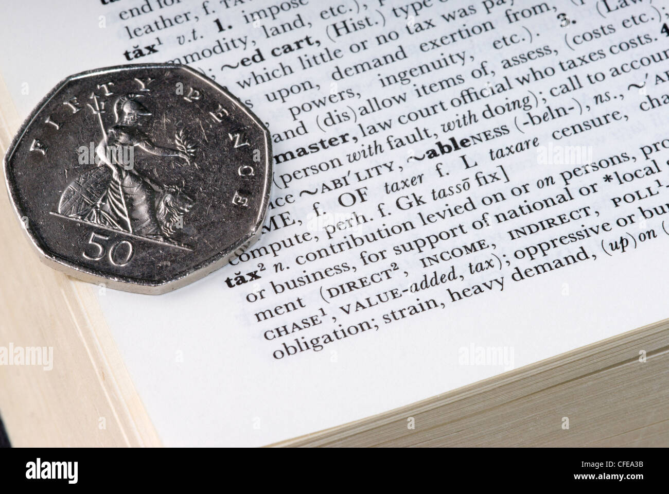 Generic image of 50 pence piece on a dictionary entry for the word Tax ...