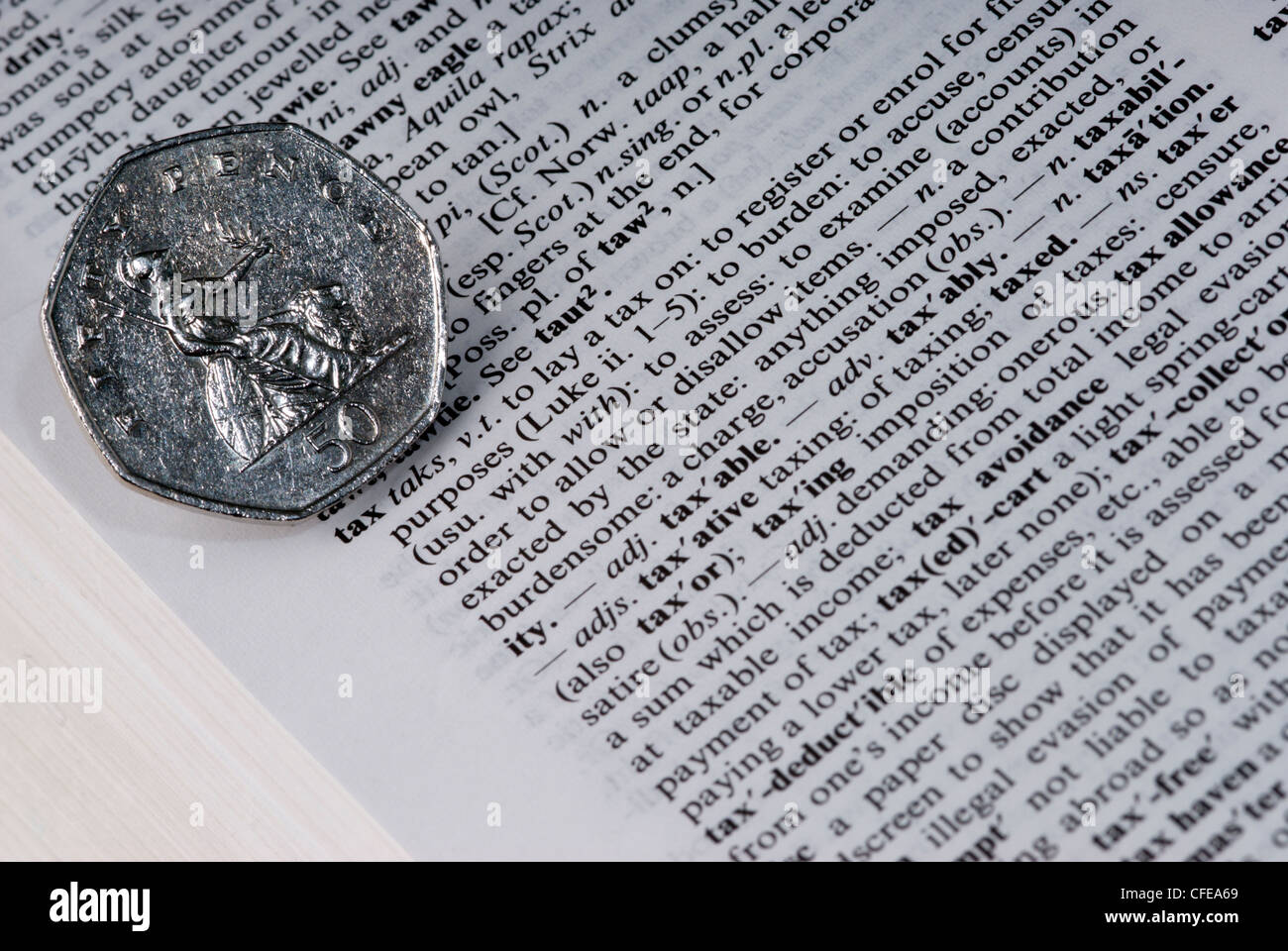 Generic image of 50 pence piece on a dictionary entry for the word Tax ...