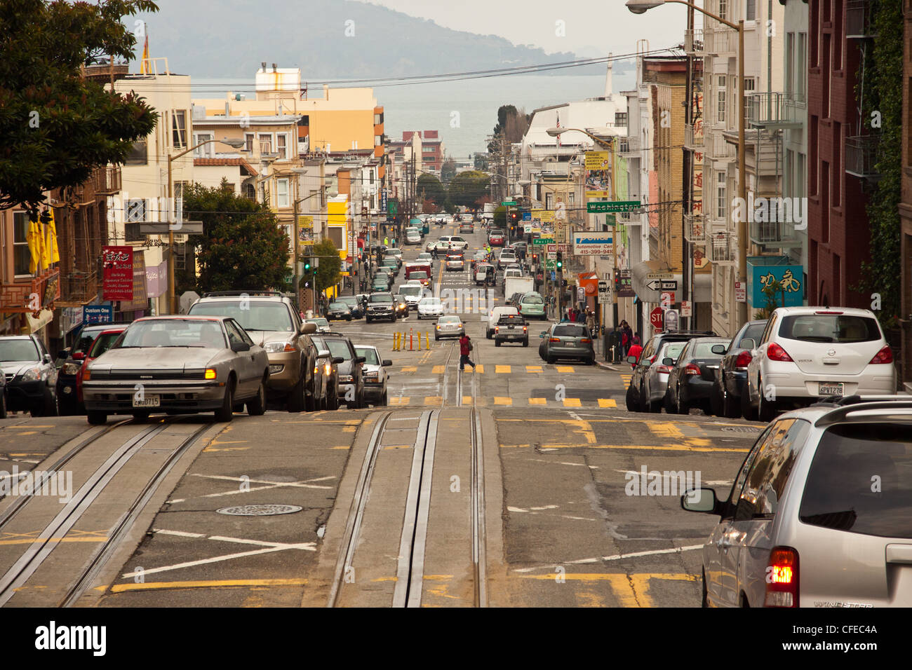san francisco street scene,showing cable car tracks with cars and taxis ...