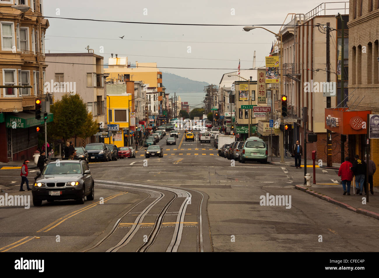 san francisco street scene,showing cable car tracks with cars and taxis ...