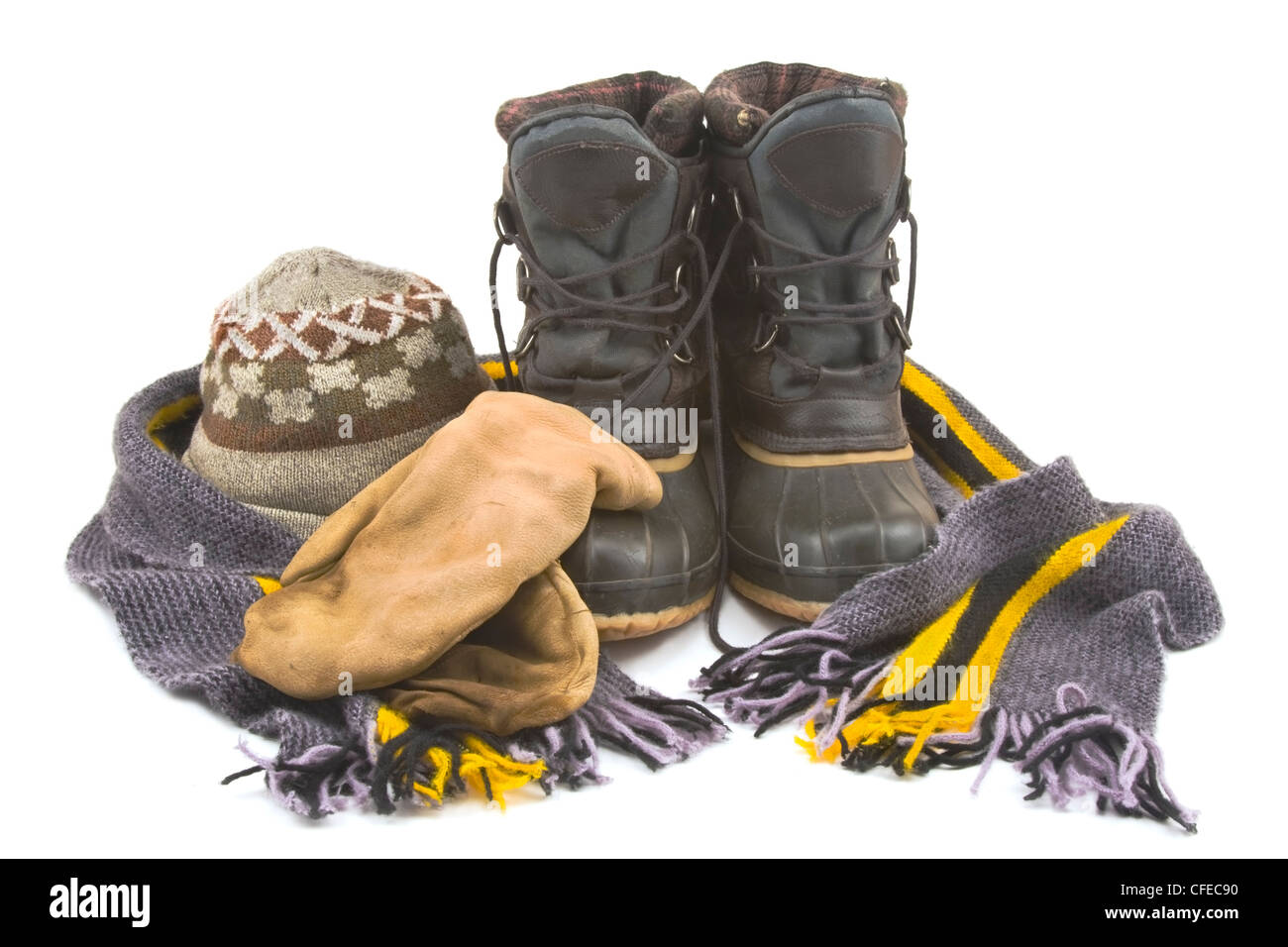 Boots gloves hat and scarf on white background Stock Photo - Alamy