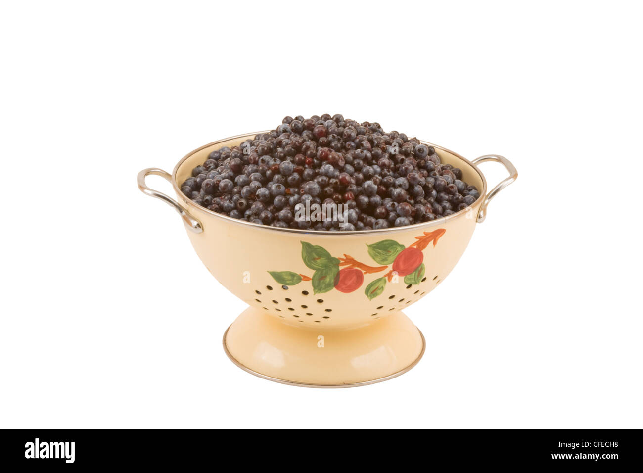 Colander full of blueberries on white background Stock Photo - Alamy
