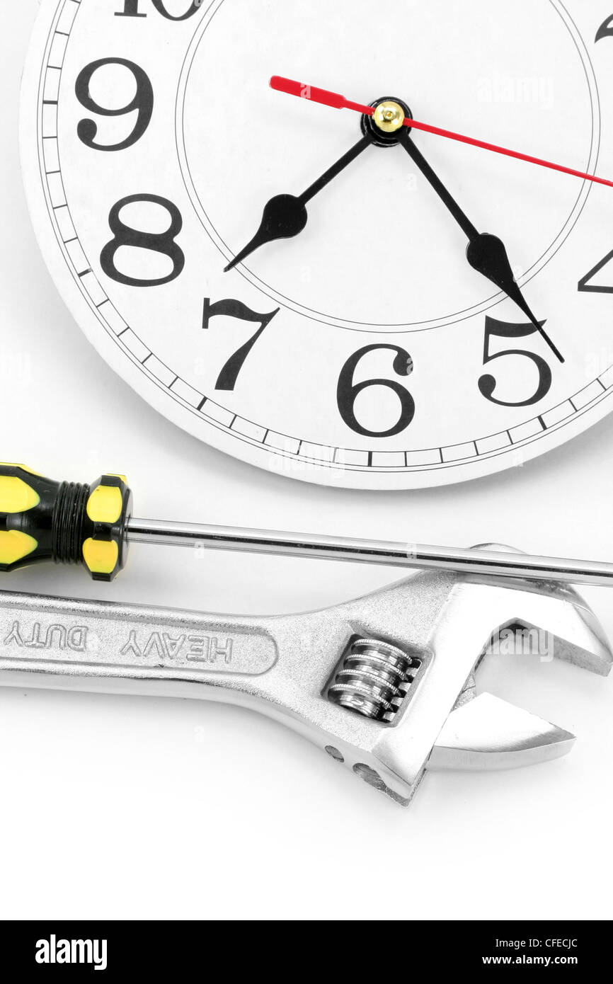 Adjustable Wrench and clock, concept of support Stock Photo - Alamy