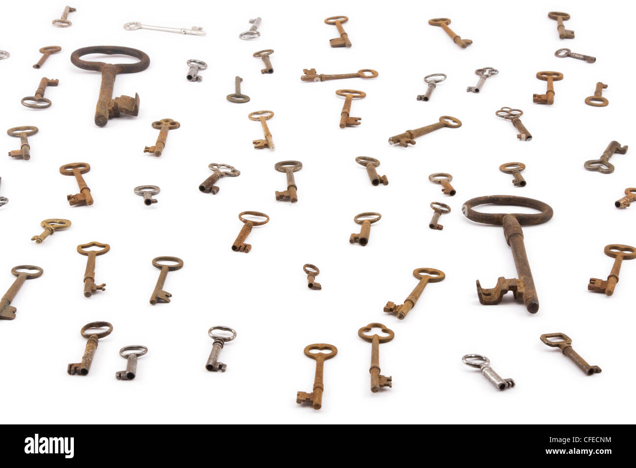 Assortment of skeleton keys on white background Stock Photo - Alamy