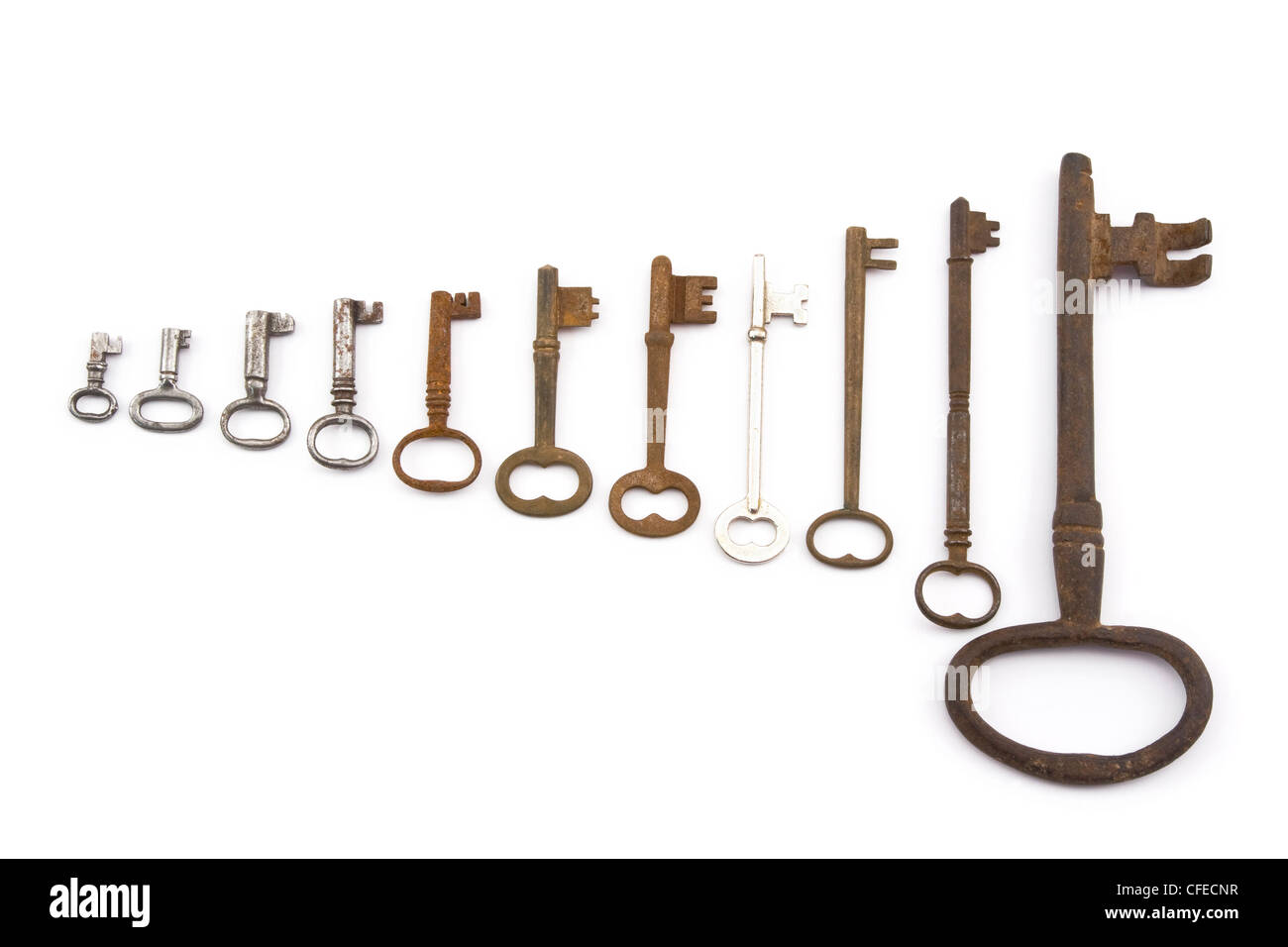 Assortment of skeleton keys cut out on white background Stock Photo - Alamy