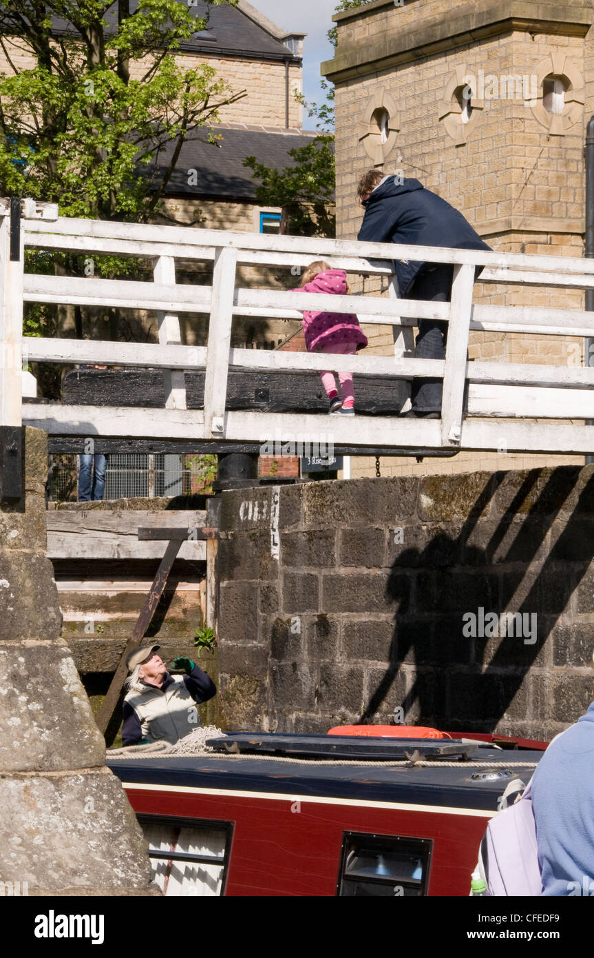 Woman looking down steep staircase hi-res stock photography and images ...
