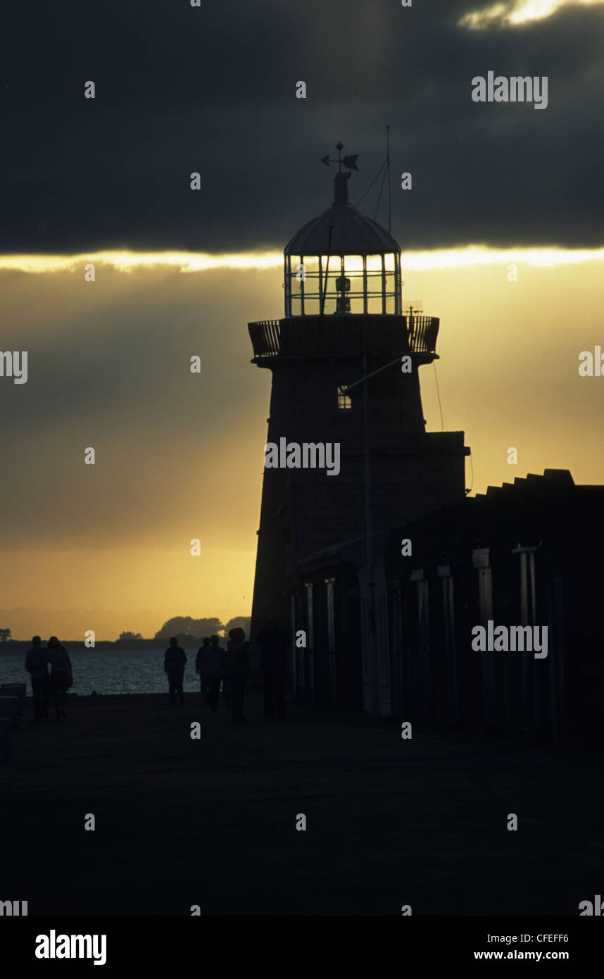 Silhouette of a lighthouse at sunset, Howth, Dublin, Republic of ...