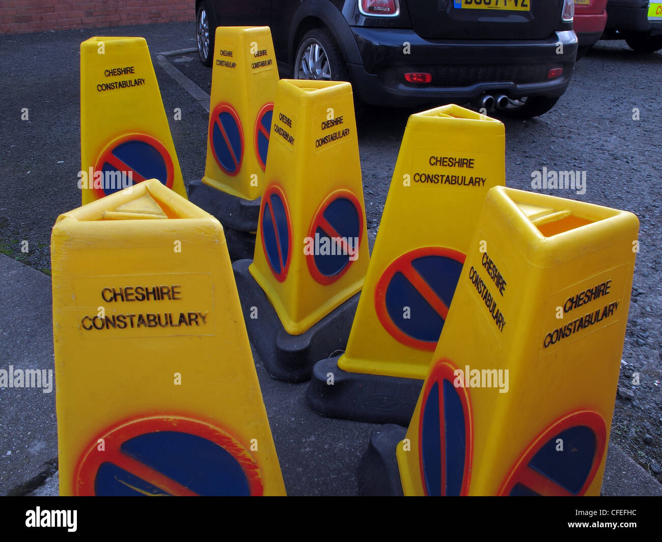 Yellow Cheshire Constabulary incident cones in road Stock Photo - Alamy