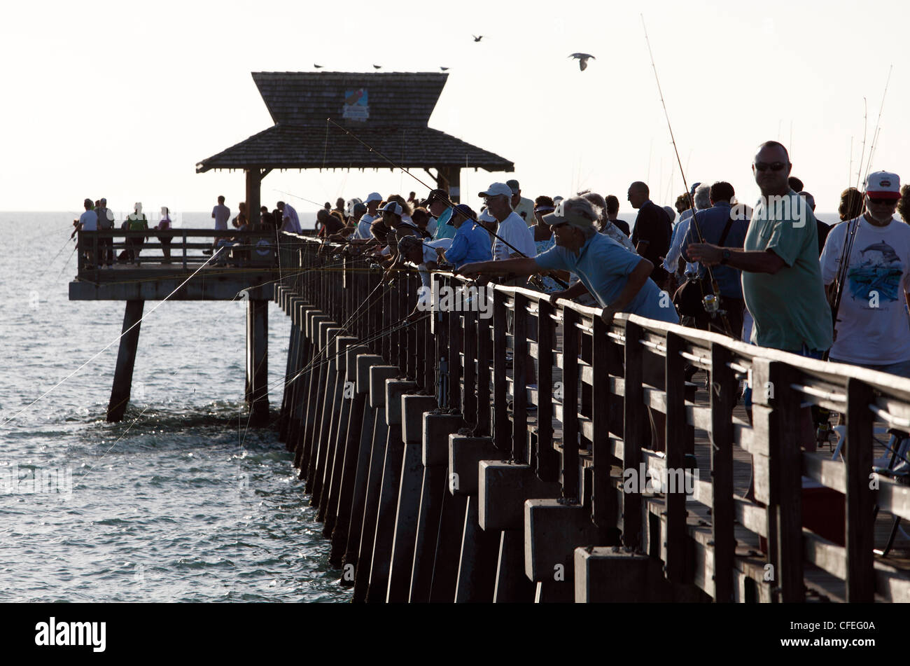 Pier fishing crowd hi-res stock photography and images - Alamy