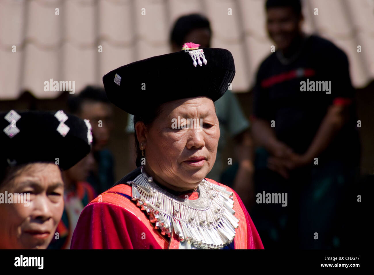 An ethnic Lisu women is attending a traditional dance ceremony in Pai ...