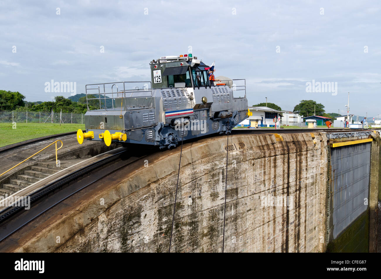 Electric mule engine guides ships through the Miraflores Locks Panama ...