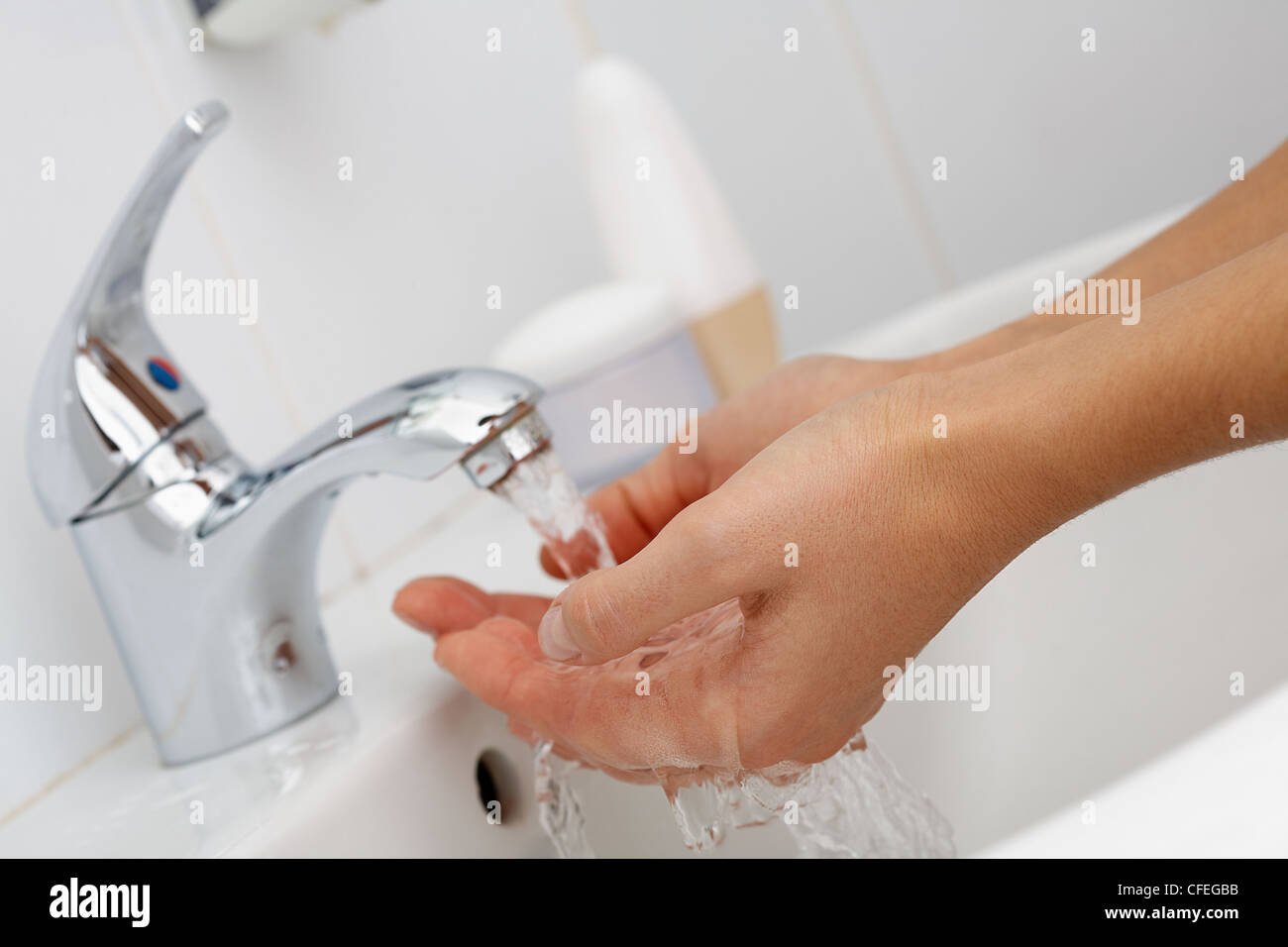 Wrists water tap hi-res stock photography and images - Alamy