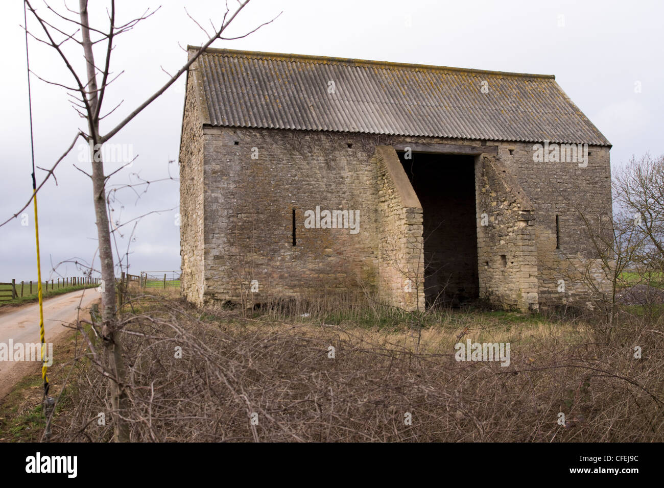 An old Cotswold stone barn on the A46 between Hawkesbury and Nailsworth ...