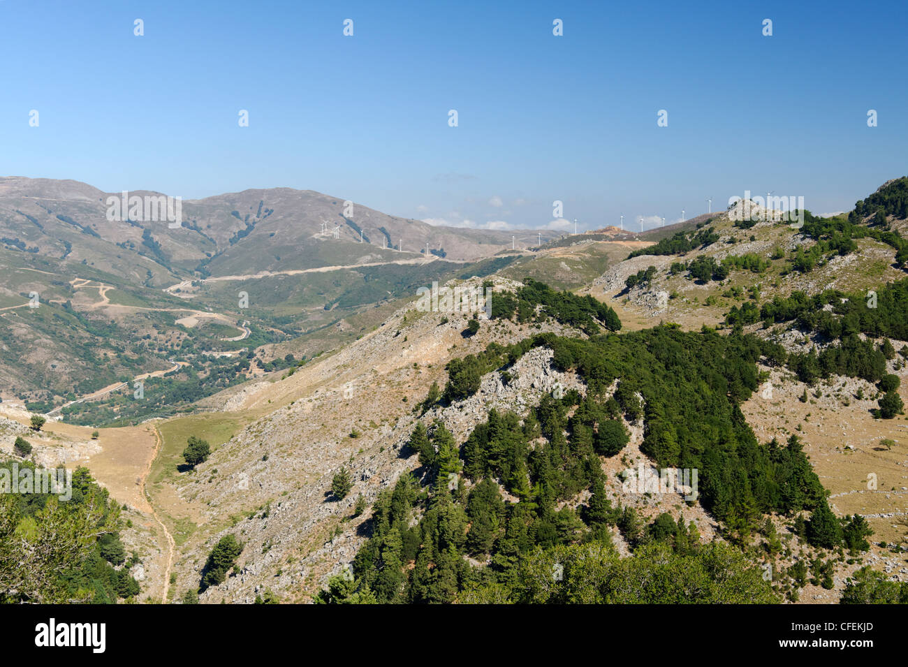 Crete. Greece. View of a wind turbine farm located high up in the ...