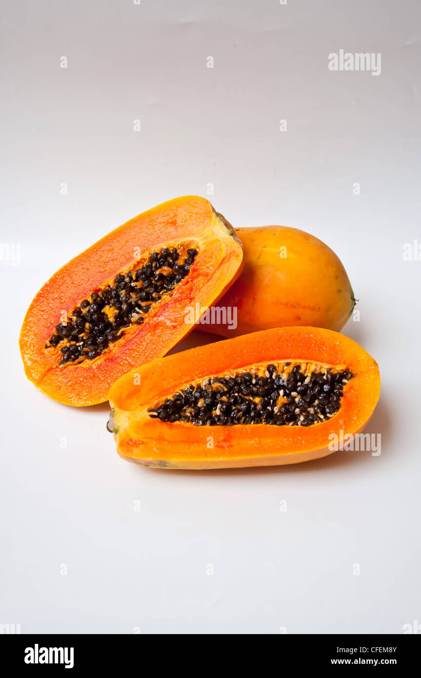 Papaya on white background Stock Photo - Alamy