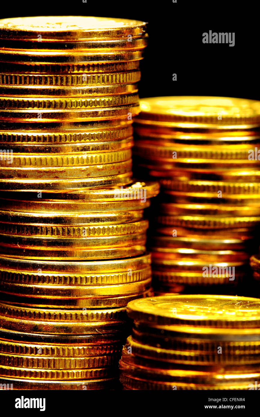 Stacks of the gold coins close up Stock Photo - Alamy