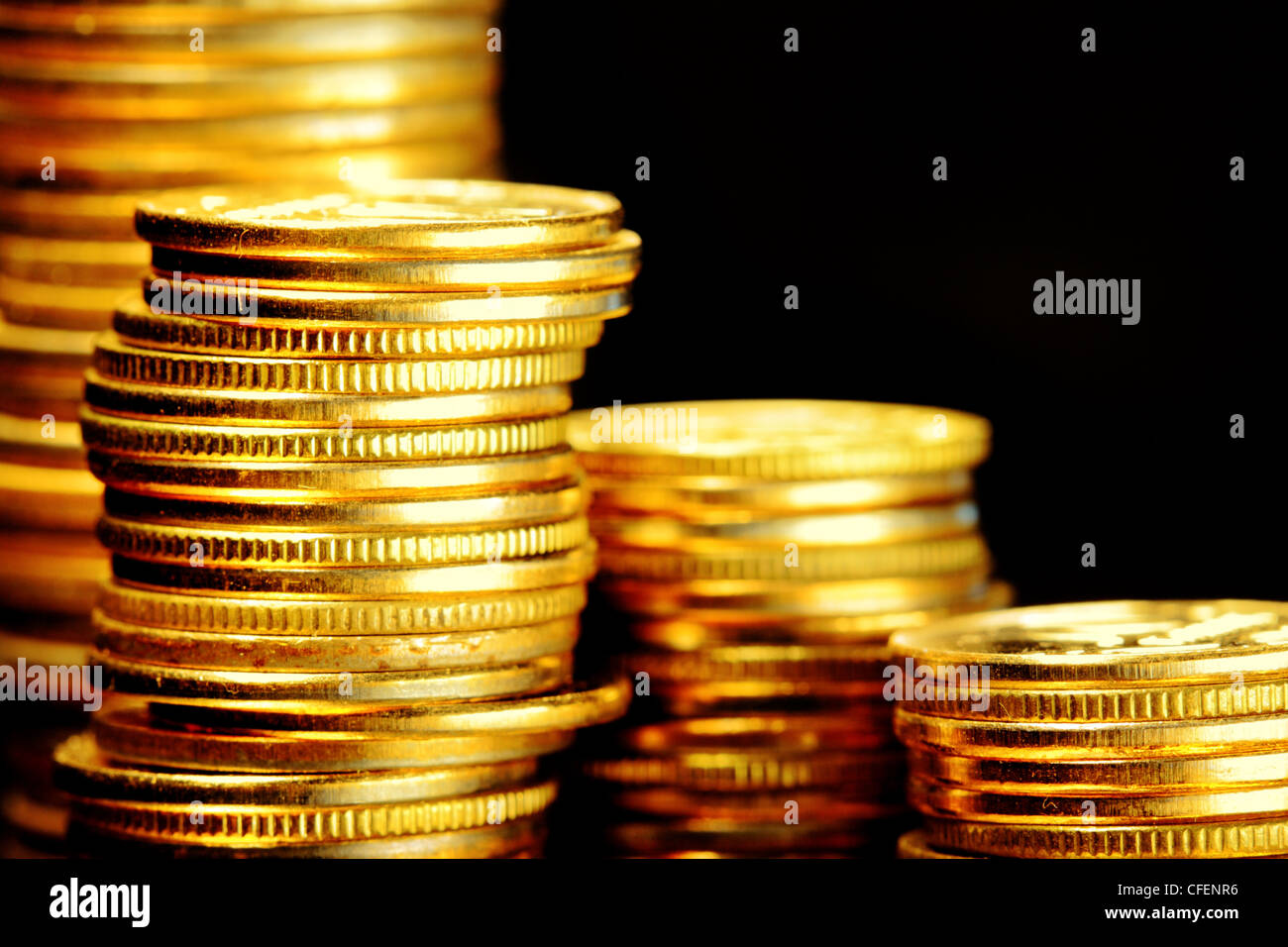 Stacks of the gold coins close up Stock Photo - Alamy