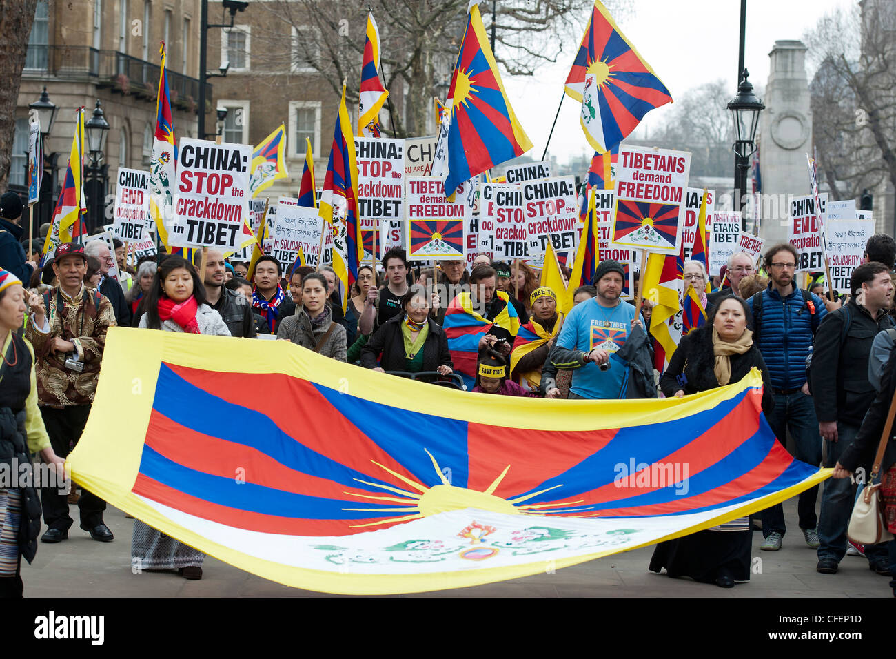 Protestors demanding a free Tibet march from Downing St to the Chinese ...