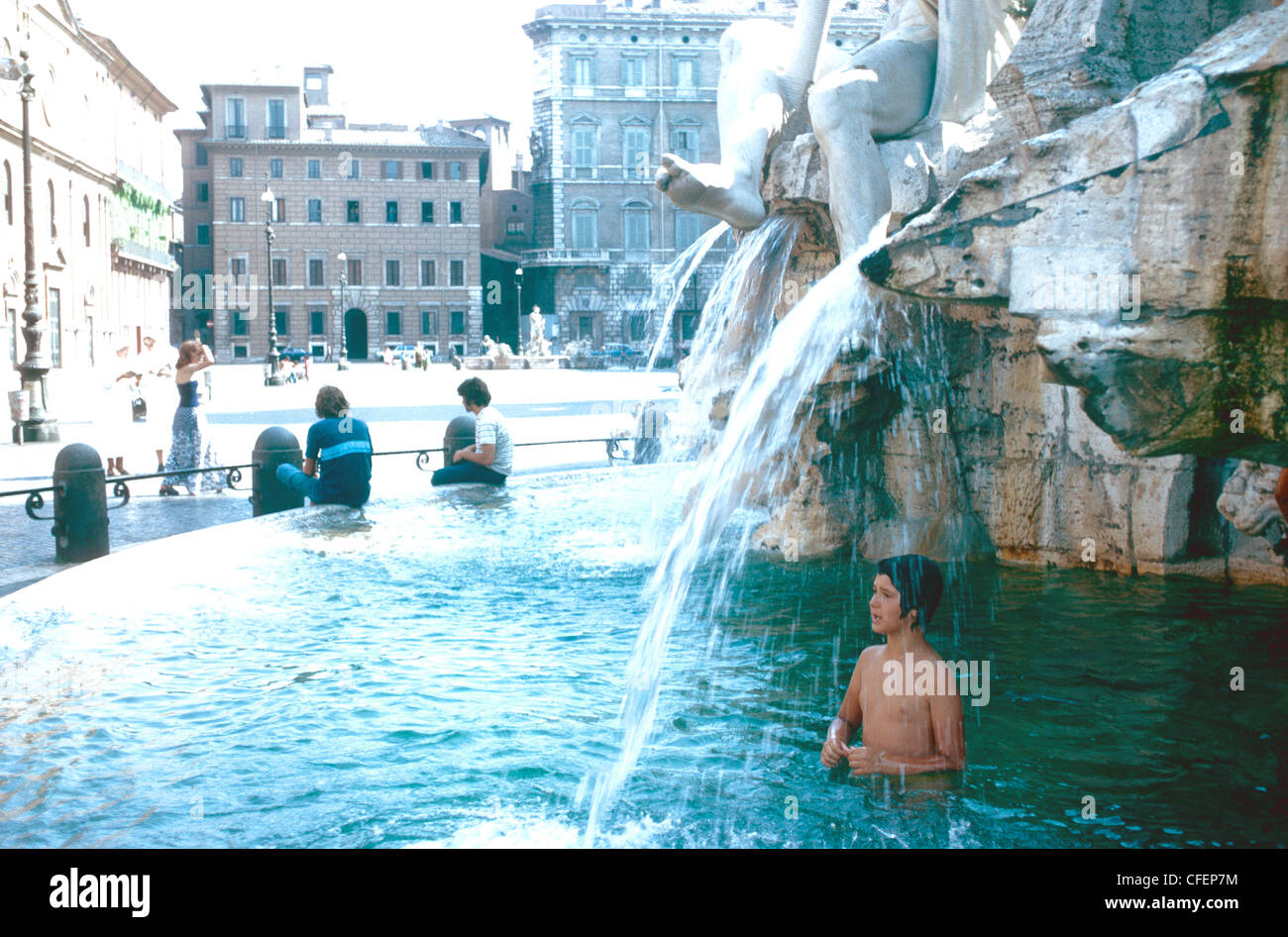 A young boy swims in a fountain in Rome Stock Photo - Alamy