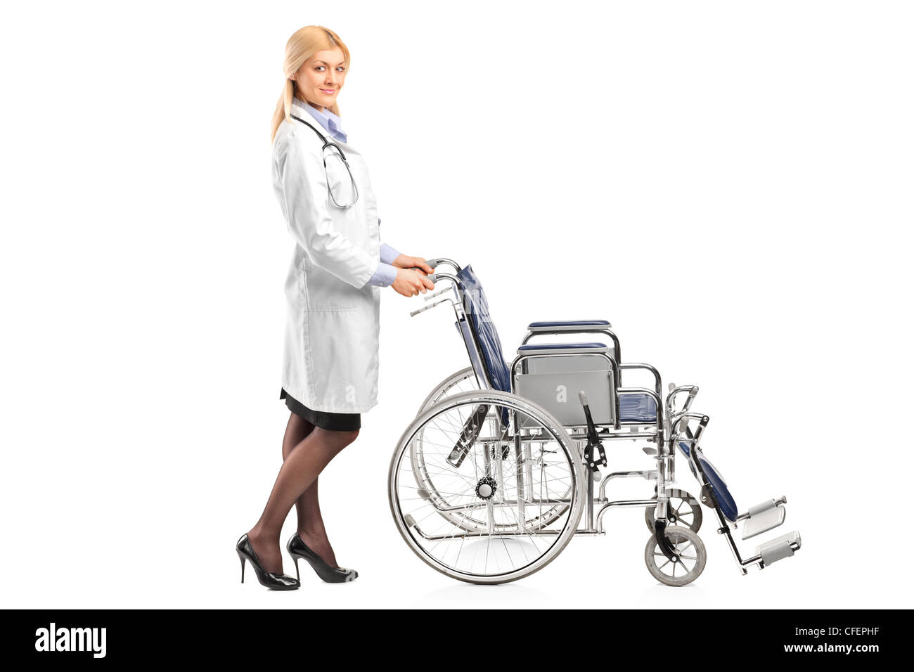 Person pushing wheelchair Cut Out Stock Images & Pictures - Alamy
