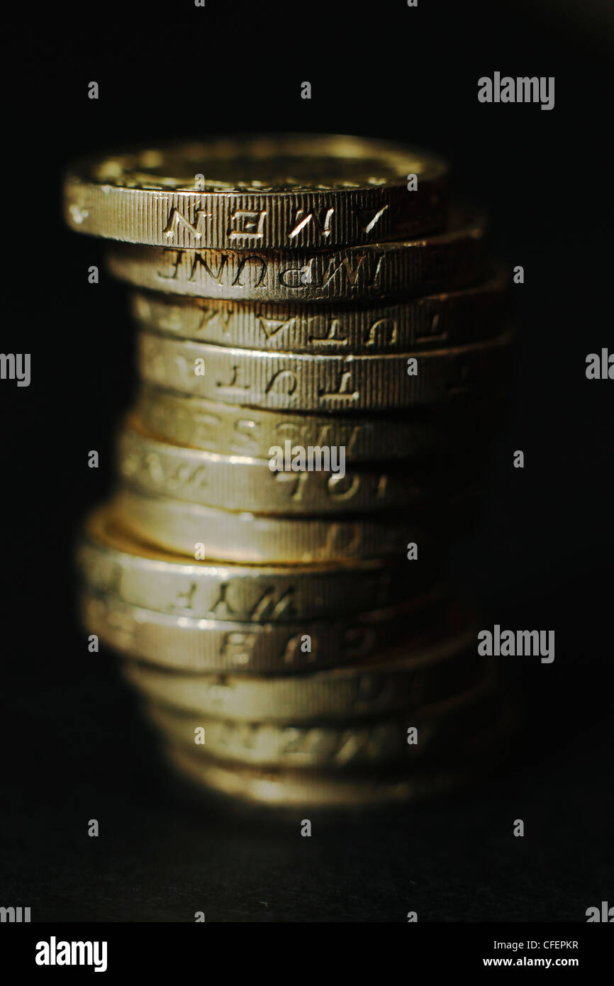 money stack of £1 one pound sterling coins Stock Photo - Alamy
