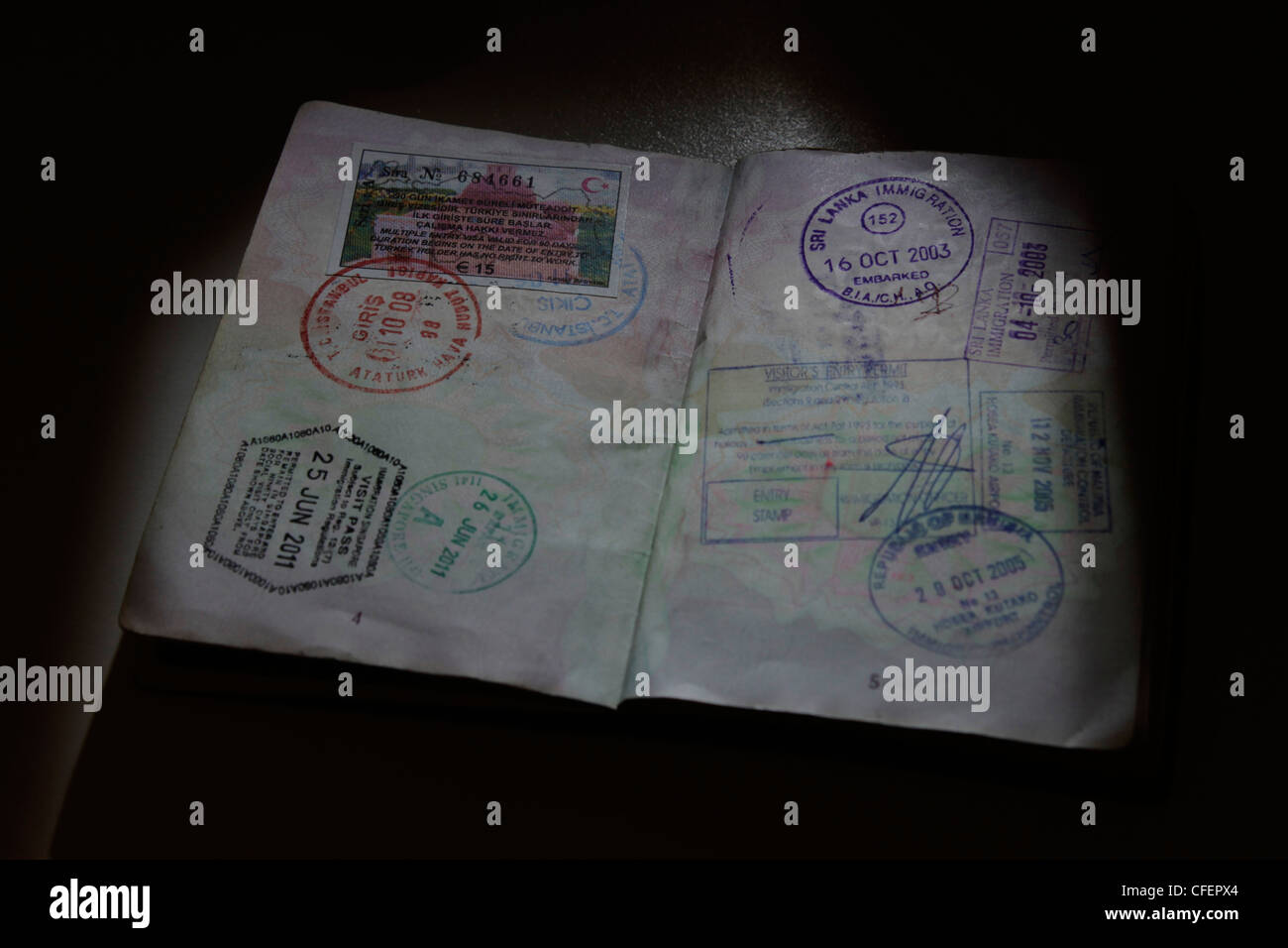 Open British passport with international customs immigration stamps ...