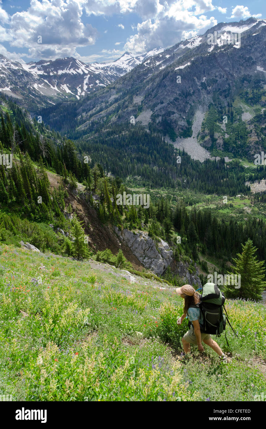 Woman backpacking Polaris Pass Trail in Oregon's Wallowa Mountains ...