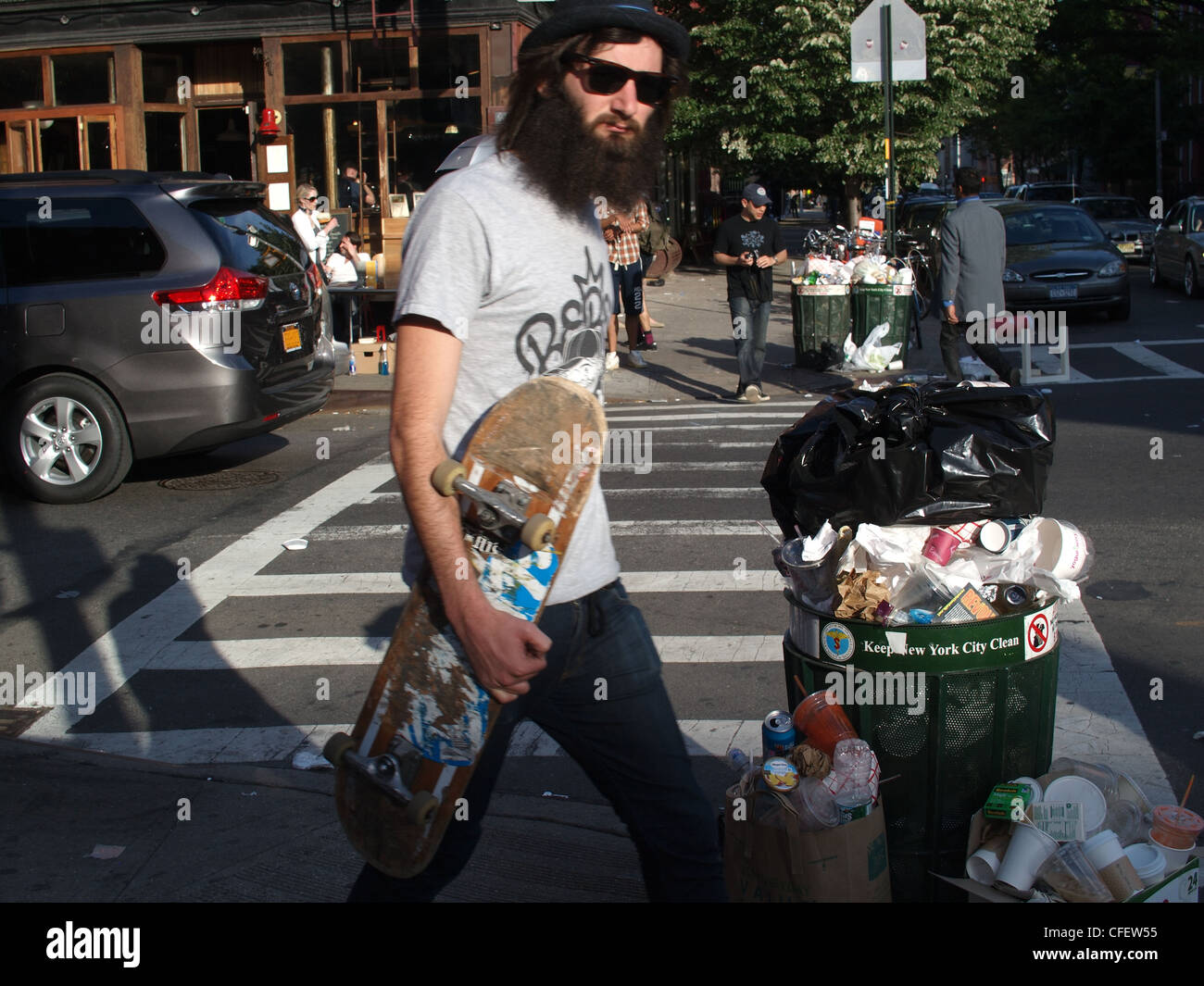 Street corner scene, man with skateboard, Brooklyn, New York Stock ...