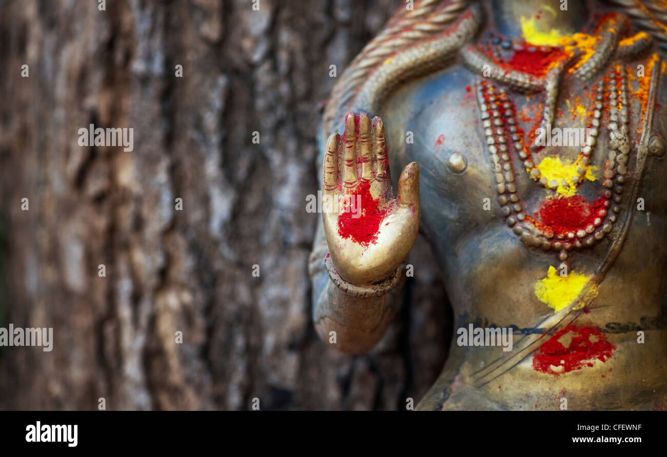 Hindu statue and tree hi-res stock photography and images - Alamy