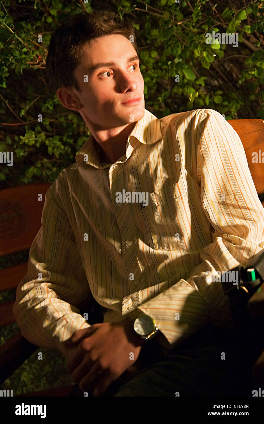 Young single guy waiting for someone in a cafe Stock Photo - Alamy
