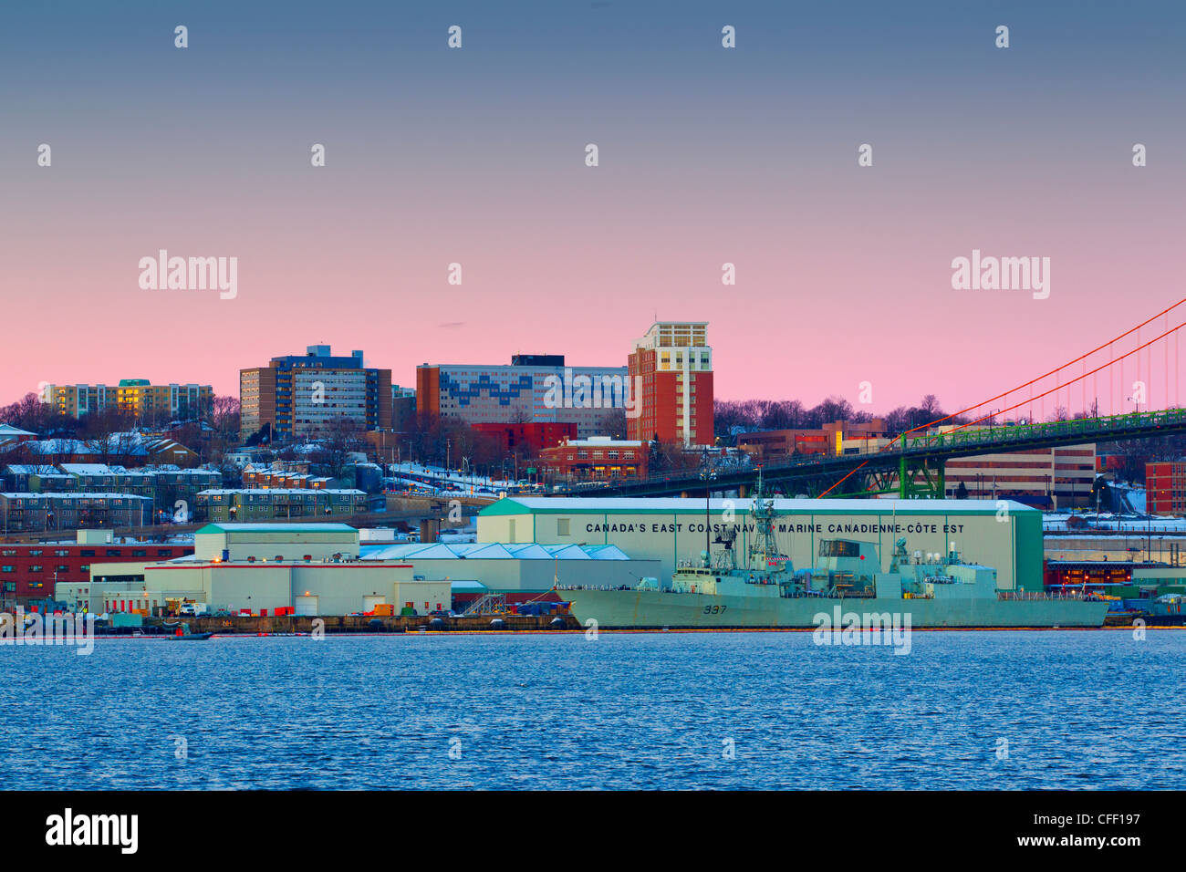 Ship tied up at Naval dockyards at dawn in winter, Halifax, Nova Scotia ...