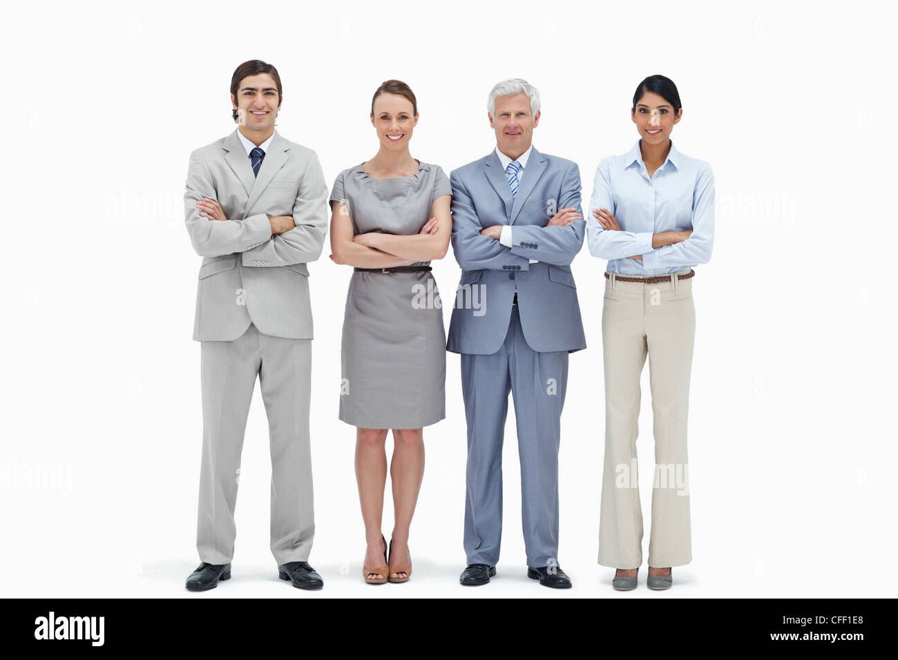 Multicultural business team smiling while crossing their arms Stock ...