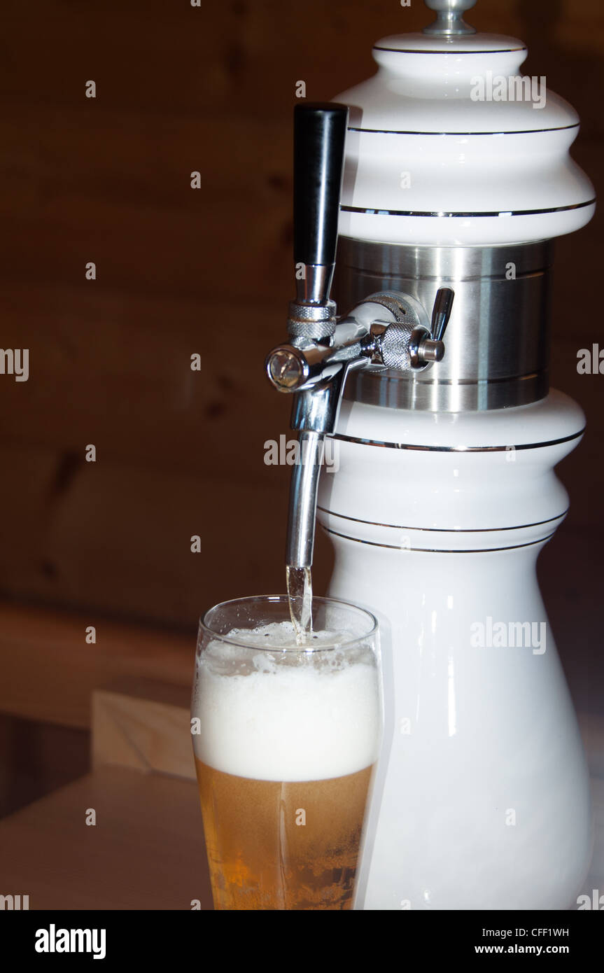Bartender pouring beer glass foam hi-res stock photography and images ...