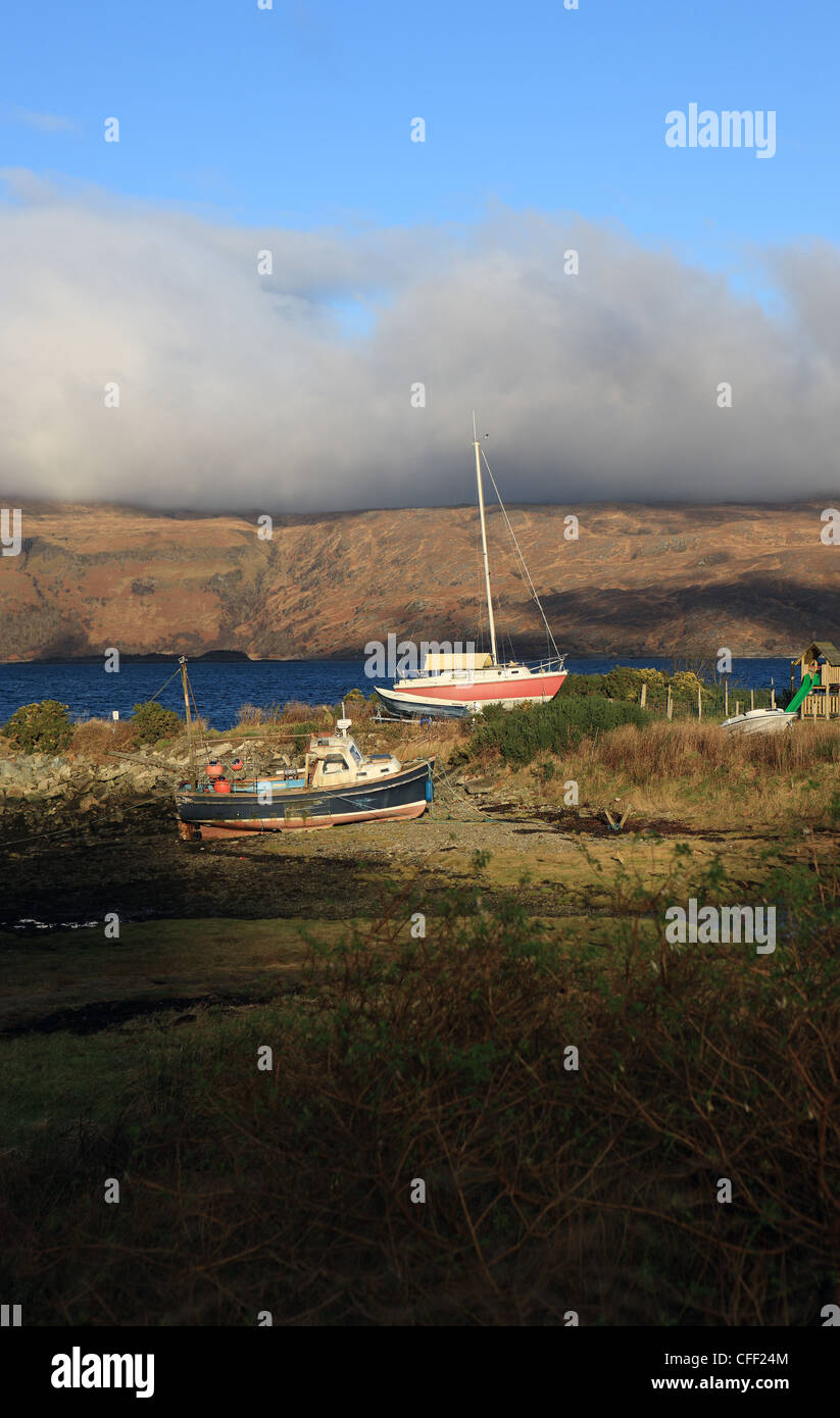 Yacht and boat out of the water at Craignure pier on the Isle of Mull ...