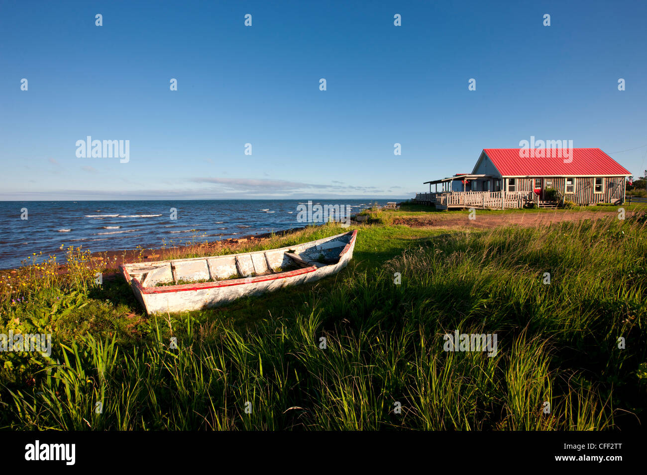 Old wooden dory in front of canteen, Point Prim, Prince Edward Island ...