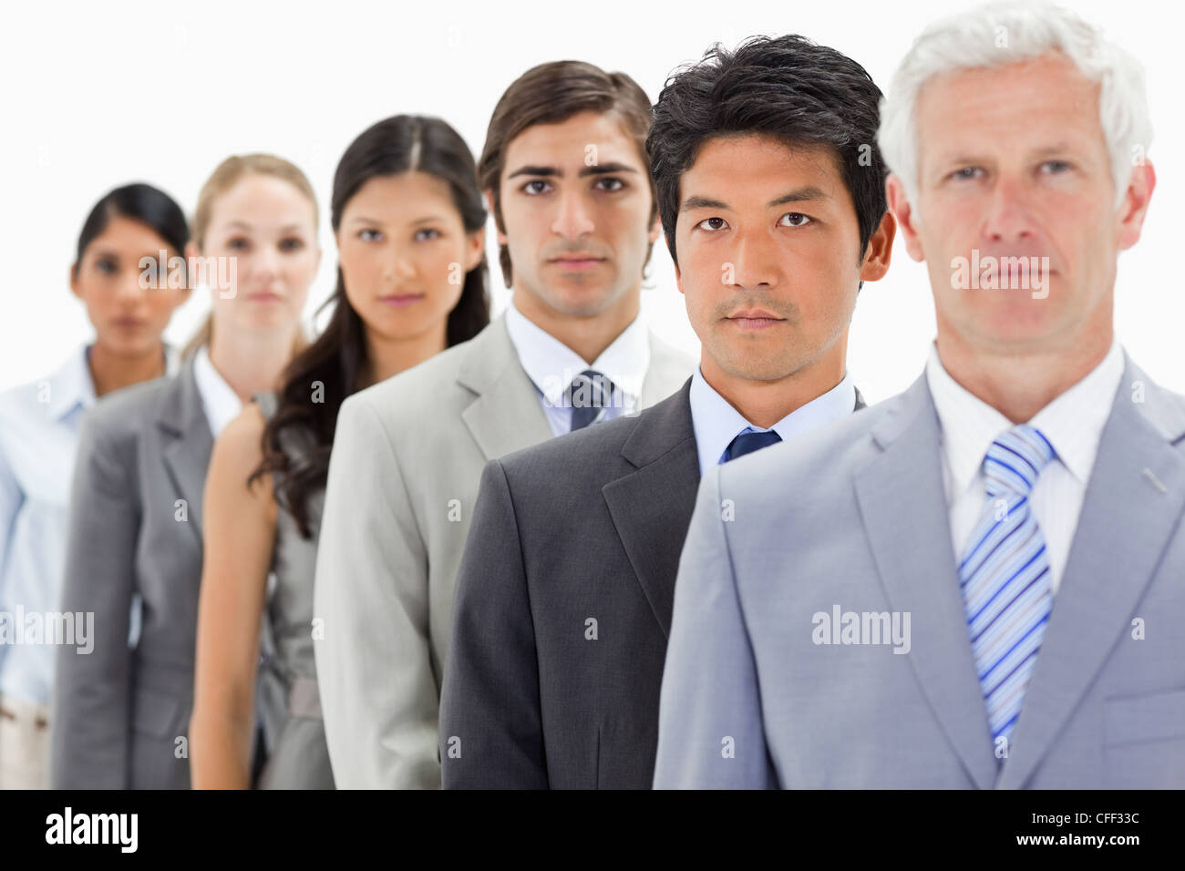 Close-up of business people in a single line with focus on the second ...