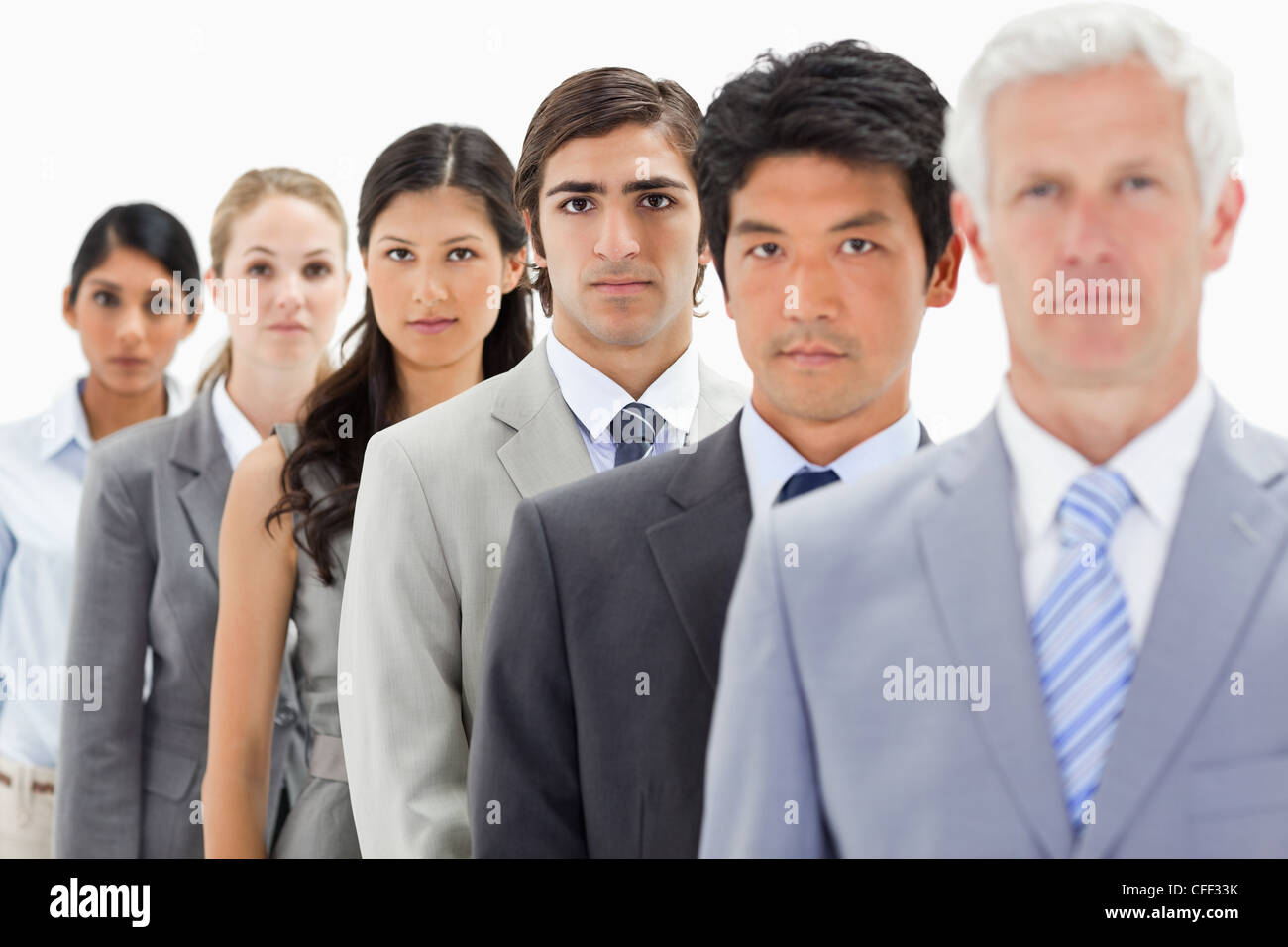 Close-up of business people in a single line with focus on the third ...
