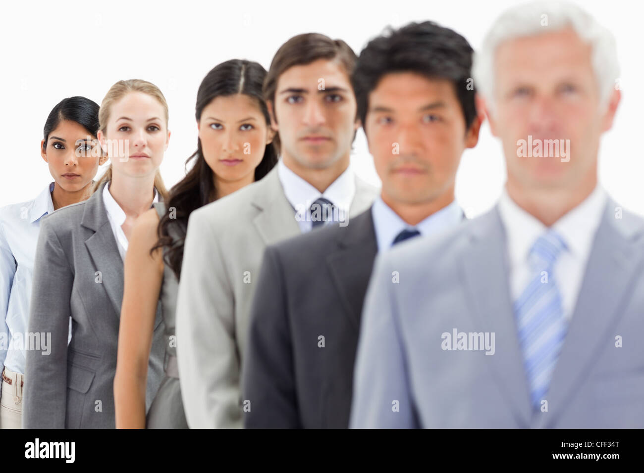 Close-up of business people in a single line with focus on the fifth ...