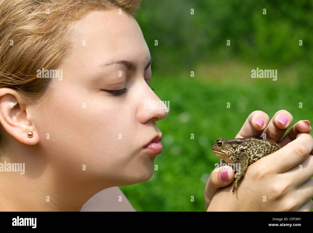 woman kissing a toad Stock Photo - Alamy