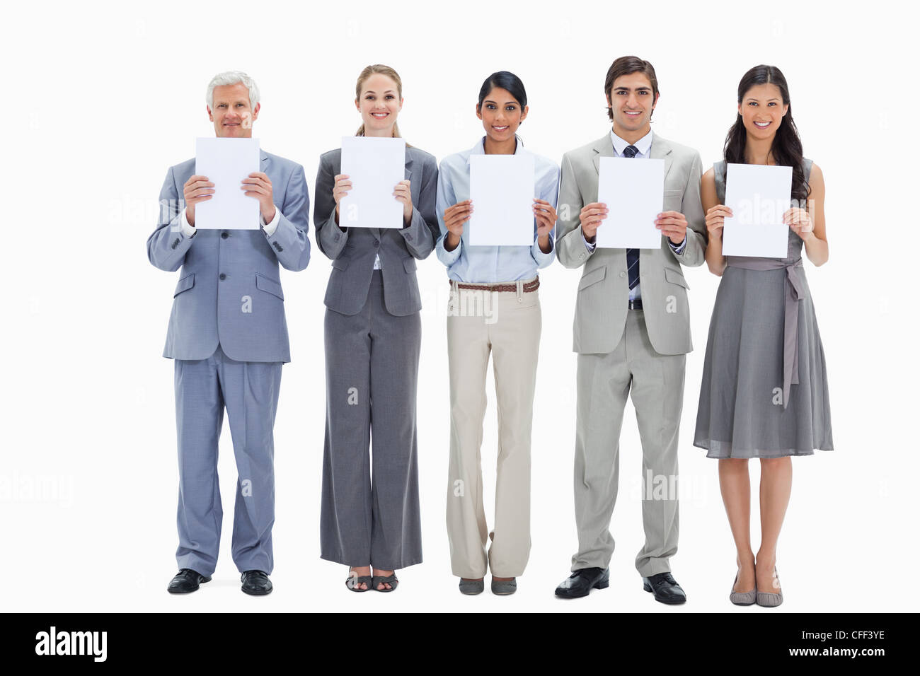 Business team holding five placards Stock Photo - Alamy