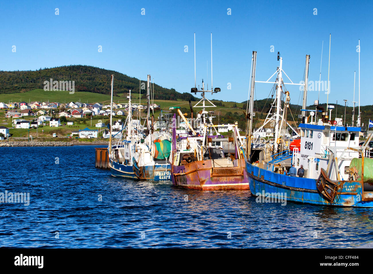 Fishing bots docked at wharf, Rivière-au-Renard, Gaspé Peninsula ...
